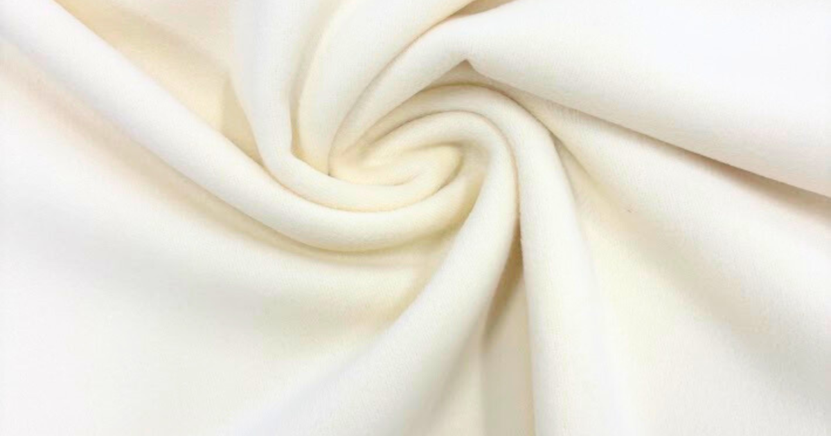 Mantelstof stretch off white brushed | €7.95 - Driessen Stoffen
